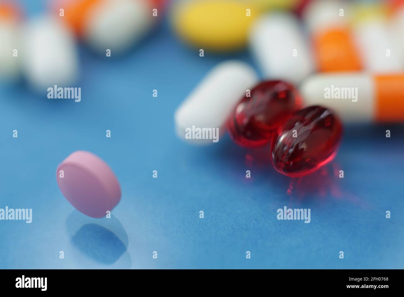 Colorful of tablets and capsules pill in blister packaging arranged ...