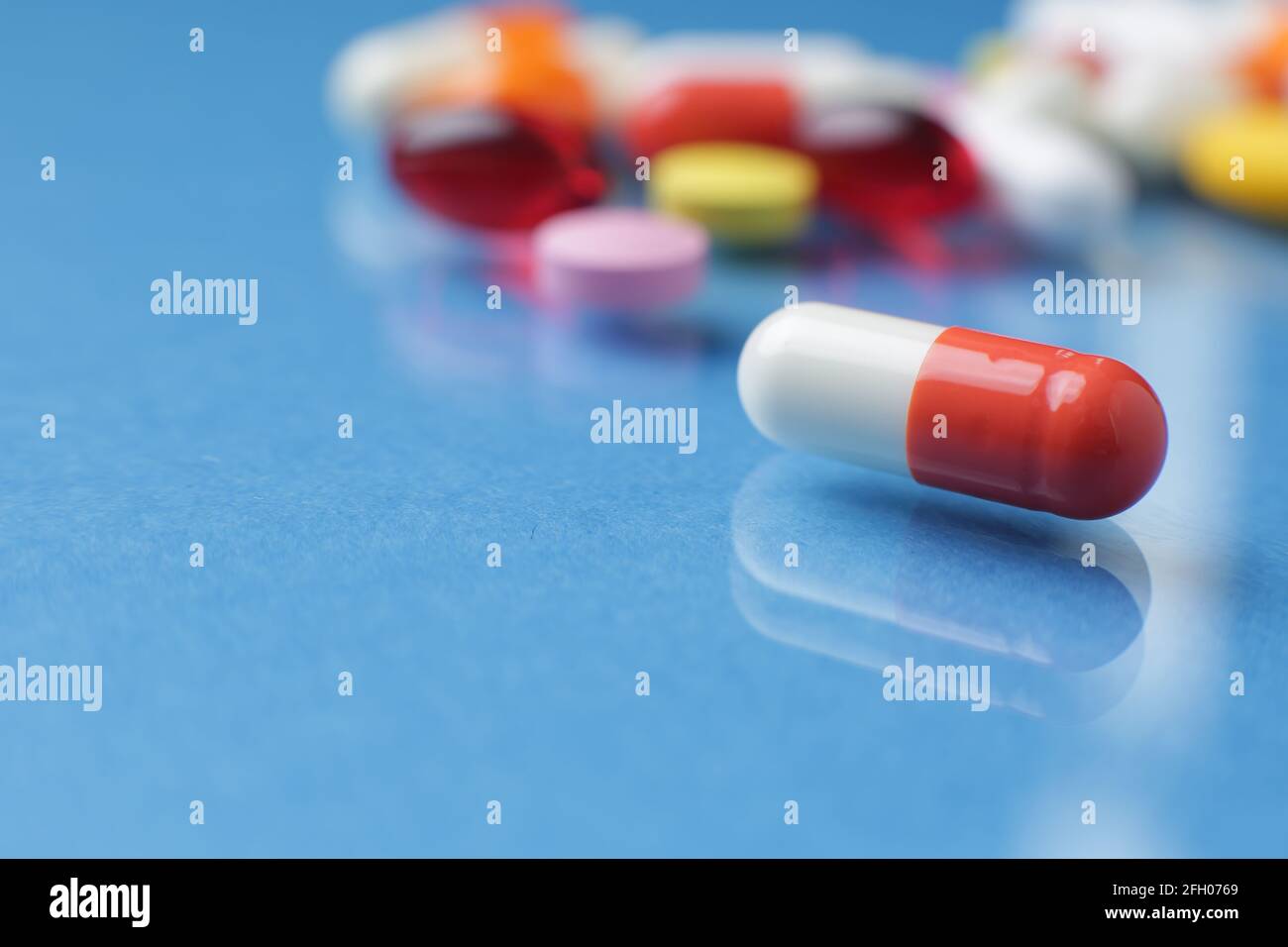 Colorful of tablets and capsules pill in blister packaging arranged ...