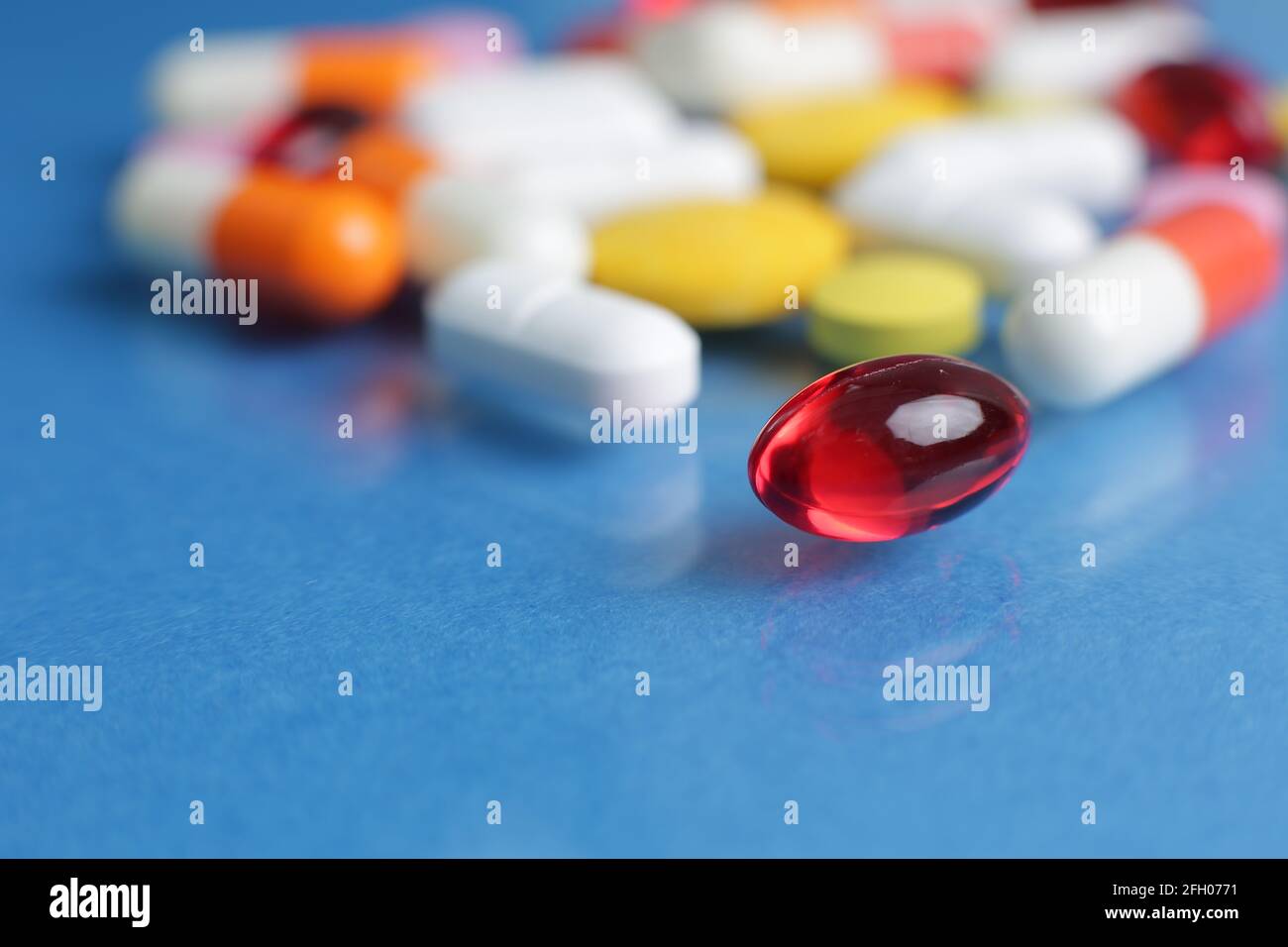 Colorful of tablets and capsules pill in blister packaging arranged ...