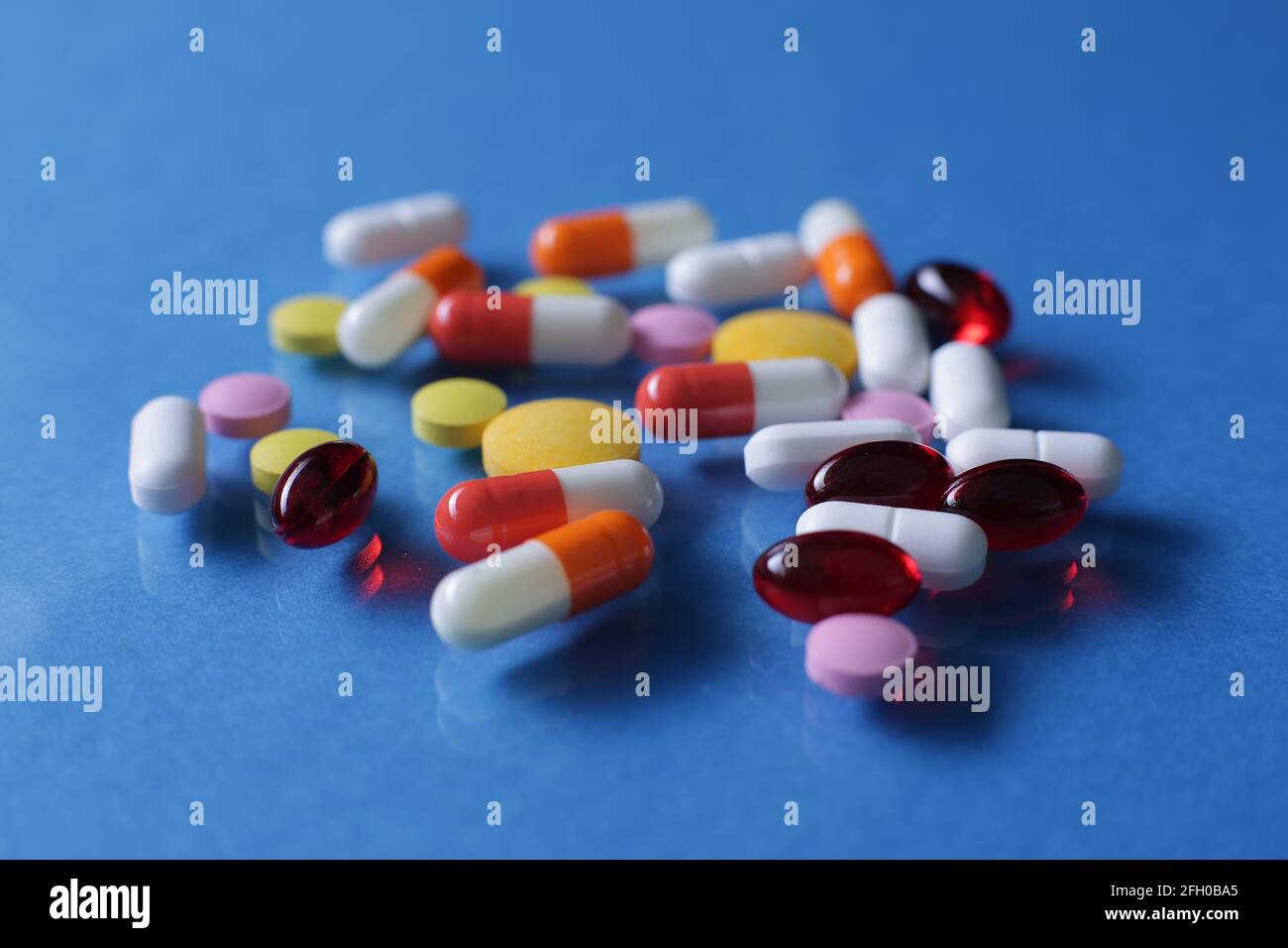 Colorful of tablets and capsules pill in blister packaging arranged ...