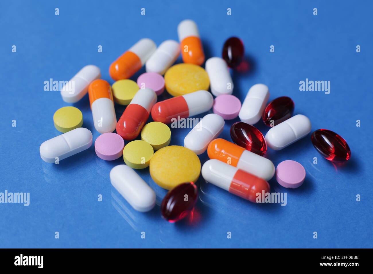 Colorful of tablets and capsules pill in blister packaging arranged ...