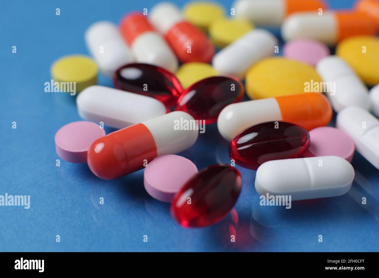 Colorful of tablets and capsules pill in blister packaging arranged ...