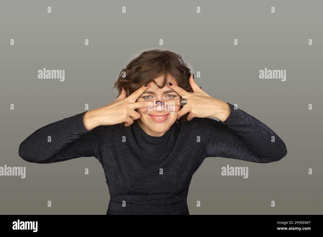 Cute Woman Making Faces Mimic And Facial Expressions Stock Photo Alamy cute-woman-making-faces-mimic-and-facial-expressions-stock-photo-alamy