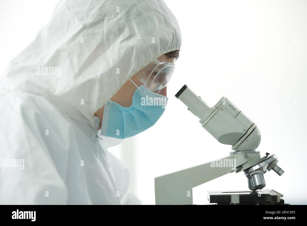 Doctor female microscope glasses hi-res stock photography and images ...