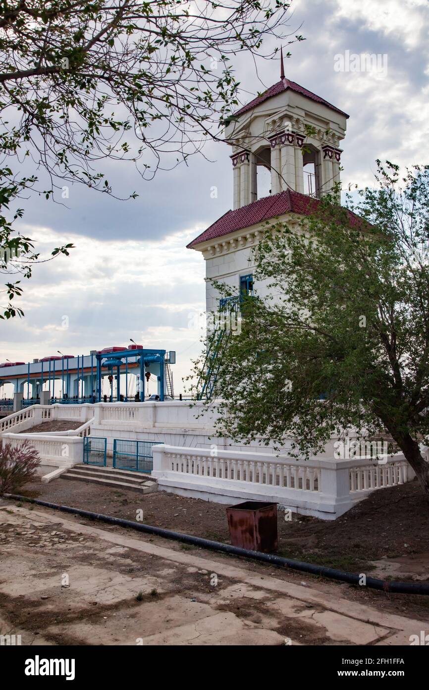 Tower building on Shardara river dam. Stalinist architecture style ...