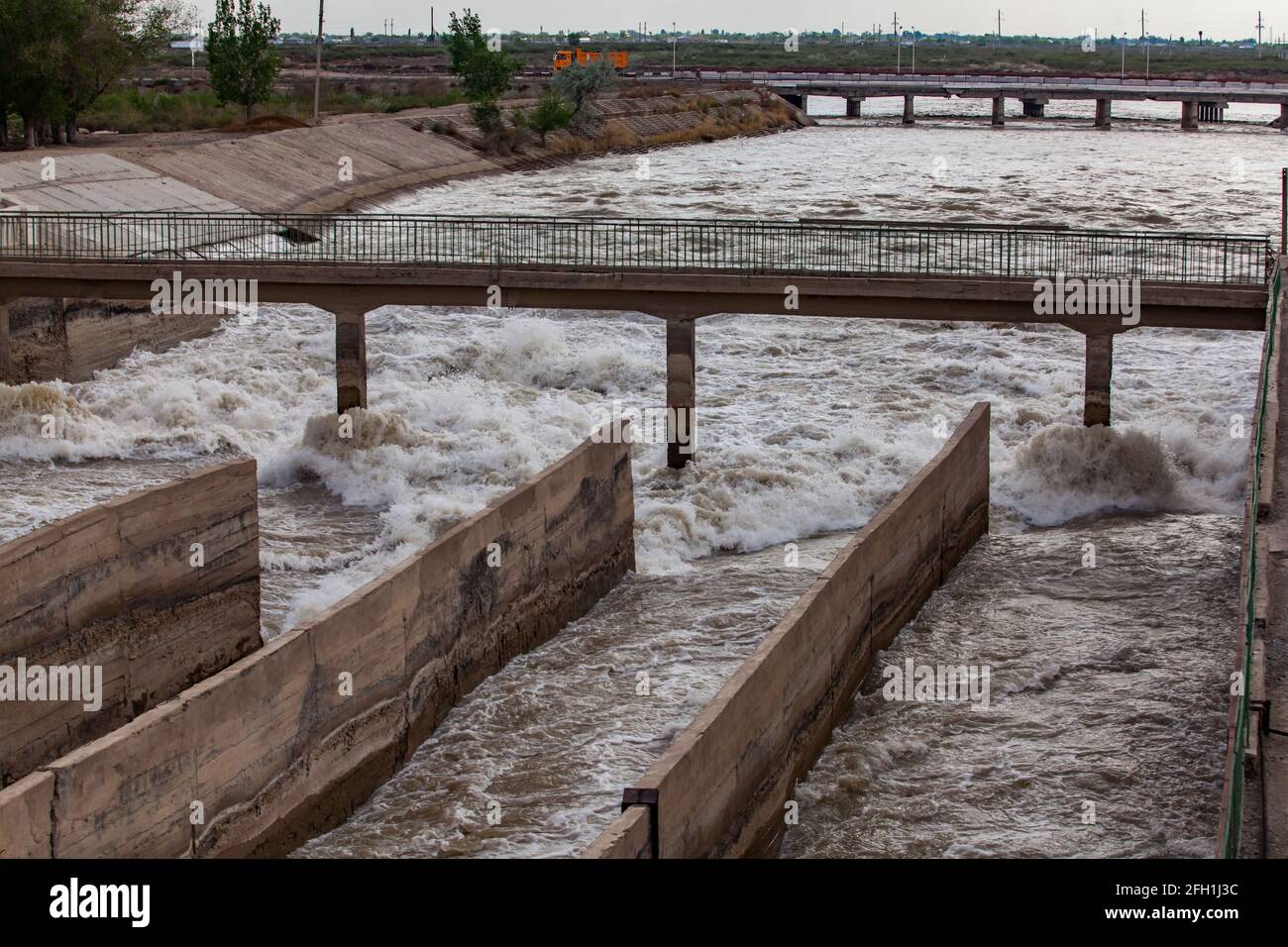 Shardara river dam.Concrete elements of Shirkeily channel. Close up ...