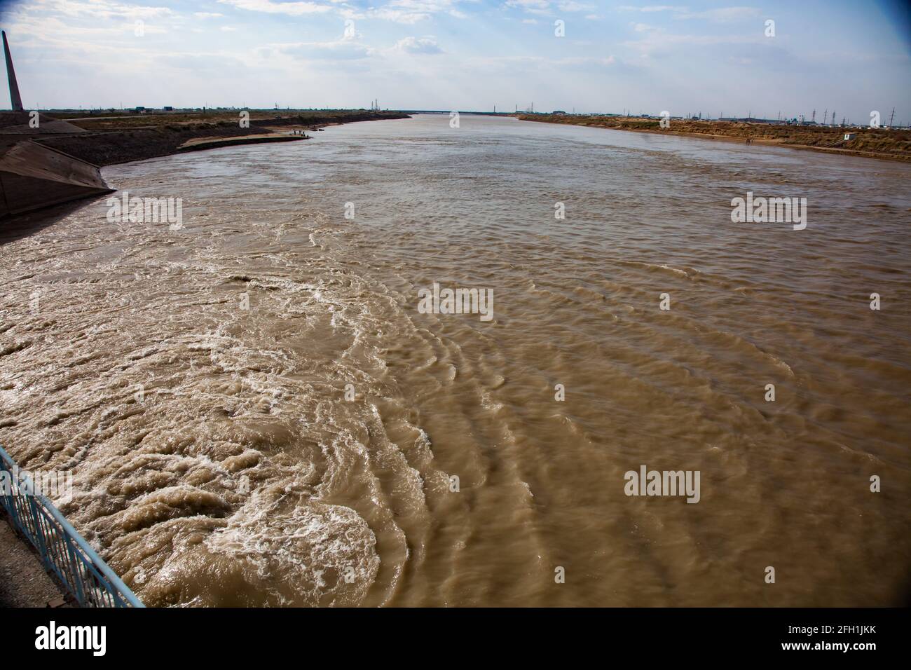 View from dam on Shardara river. Yellow water. Panorama view. Kyzylorda ...