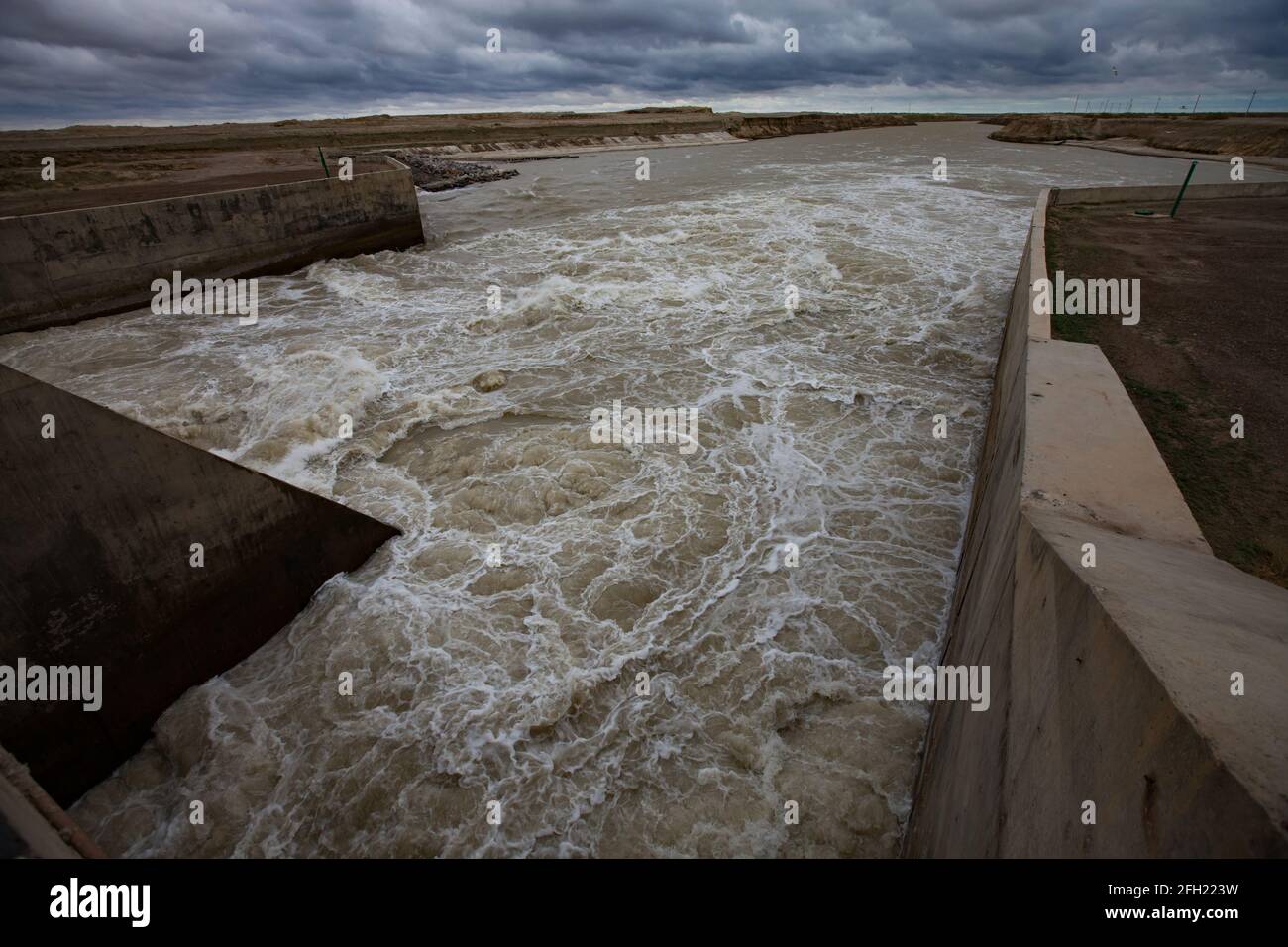 Aklak dam, Kzylorda region, Kazakhstan. Concrete channel on Shardara ...
