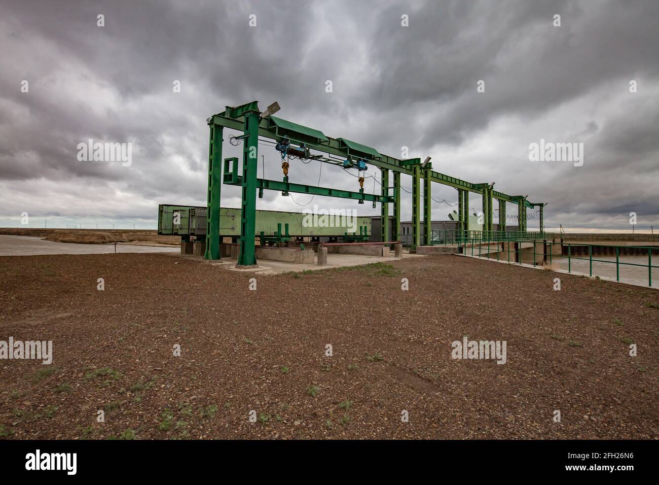 Aklak dam on Shardara river. Hoisting device of water shutter metal ...