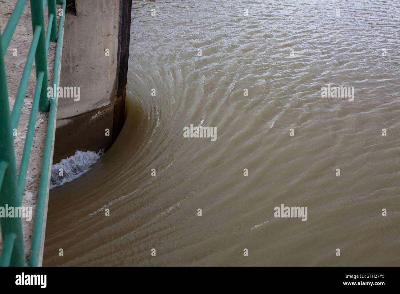 Aklak dam on Shardara river. Close up photo of water stream around ...