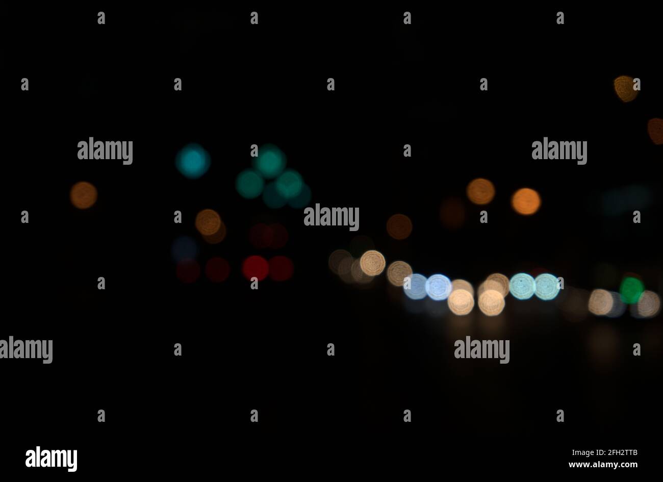 Bokeh of night shot, road, street lights, transportation abstract in ...