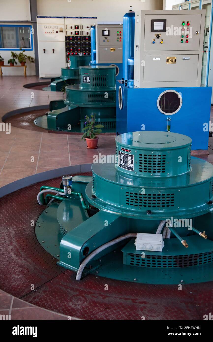 Almaty reg., Kazakhstan:Hydroelectric power plant machine room.Green ...