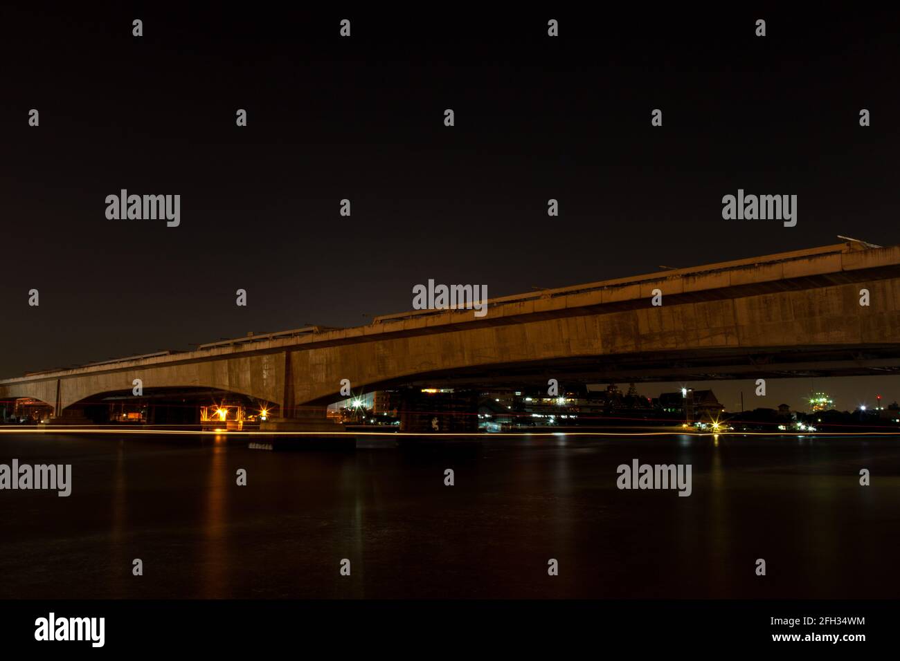 Bridge across the river. Below is the commute. Bridge lights Stock ...