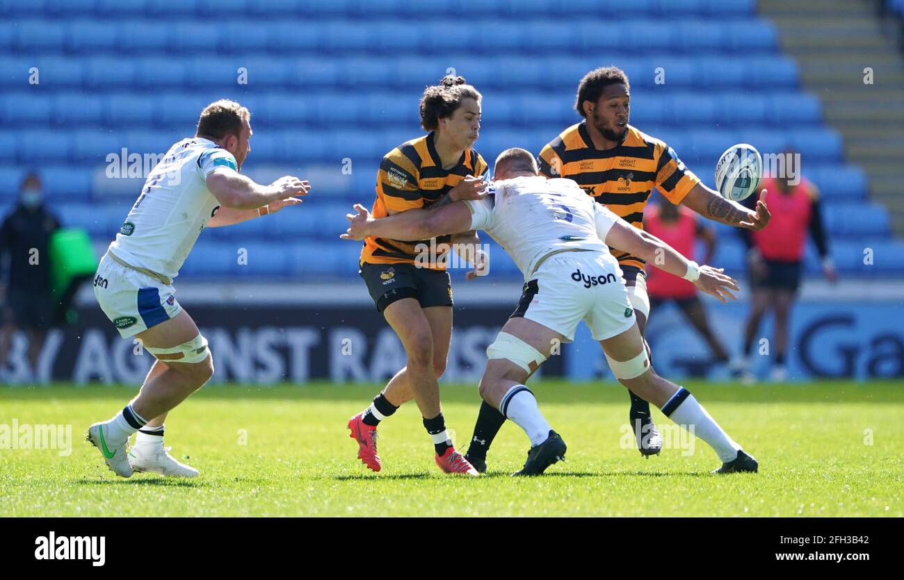 Bath's Charlie Ewels (centre right) tackles Wasps' Jacob Umaga during ...