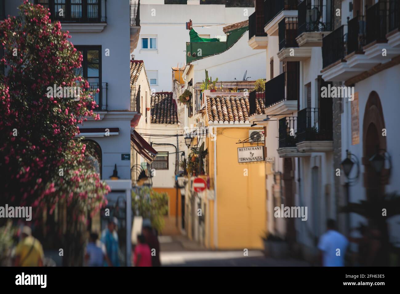 Beautiful street view of Denia, Marina Alta with harbor and skyline ...