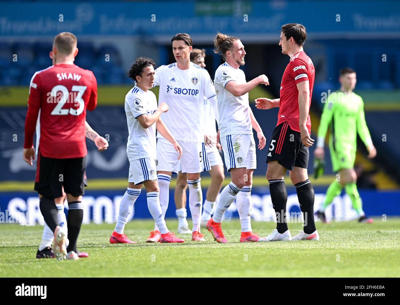 Leeds United's Luke Ayling and Manchester United's Harry Maguire (right ...