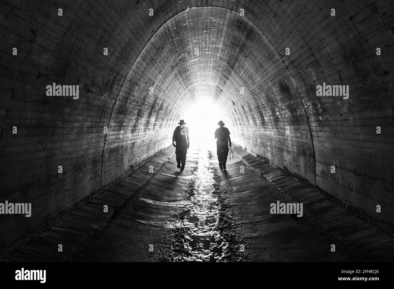Tunnel on rocks Black and White Stock Photos & Images - Alamy