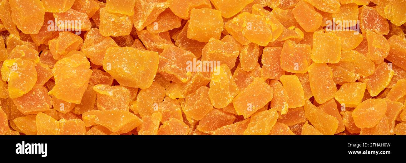 background and texture of dried mango fruit diced, panoramic web banner ...