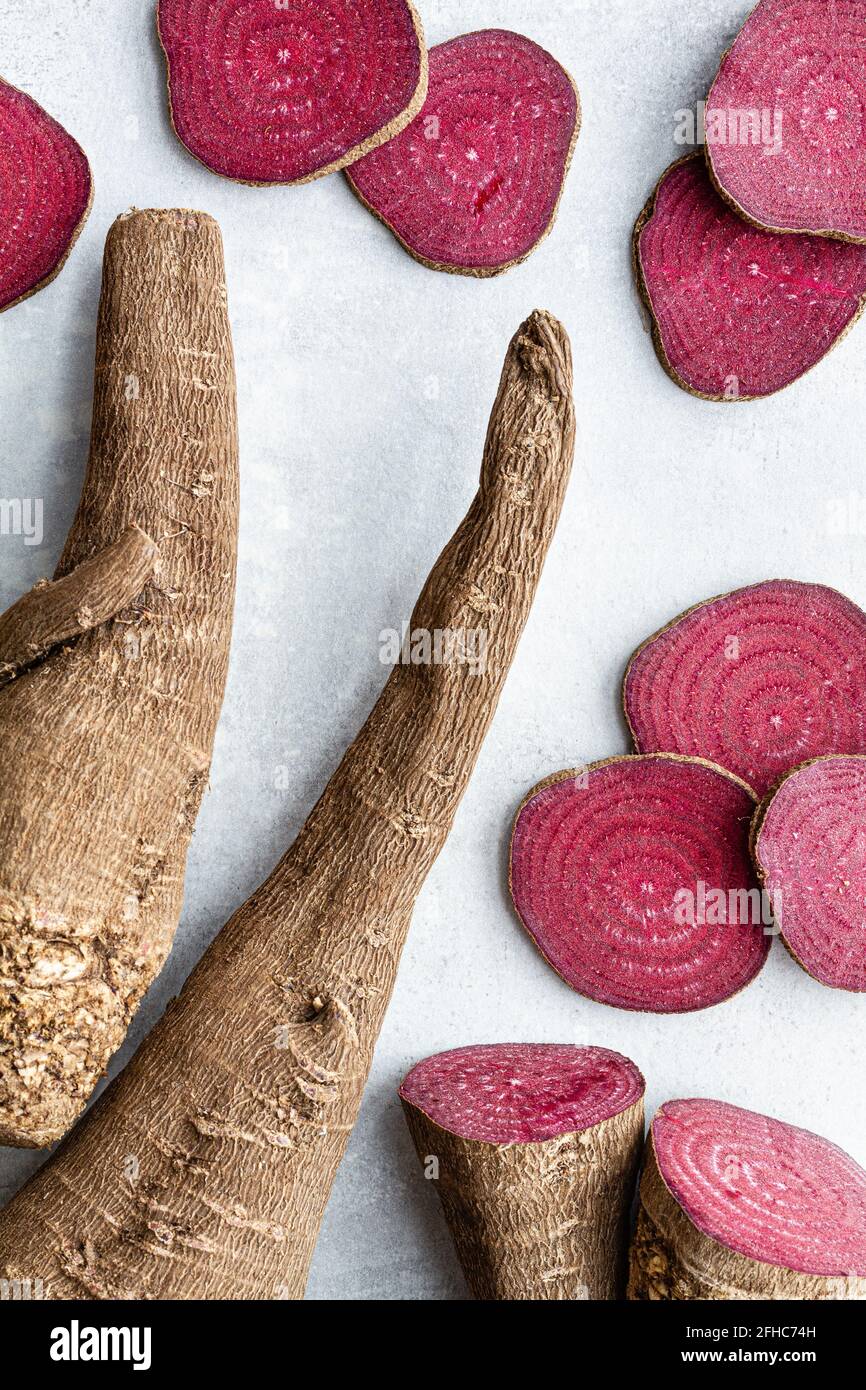 Overhead composition of organic natural beetroot cut into slices and ...