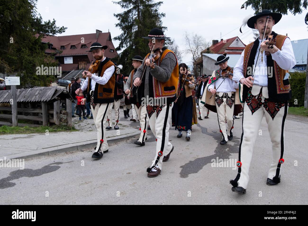 Ludzmierz, Poland. 25th Apr, 2021. Highlanders play music while walking ...