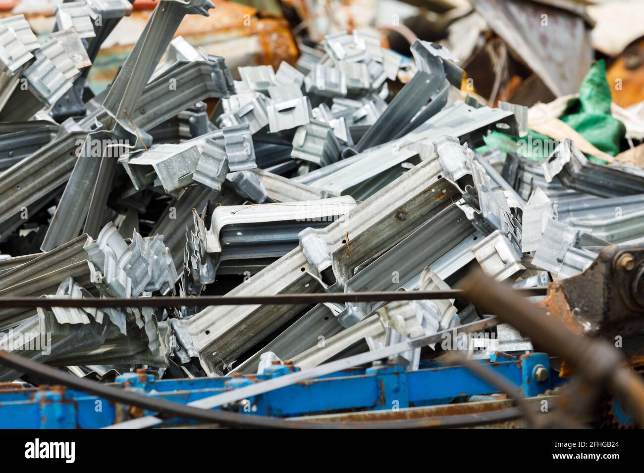Closeup old and rusty galvanized iron scrap, recyclable waste junk ...