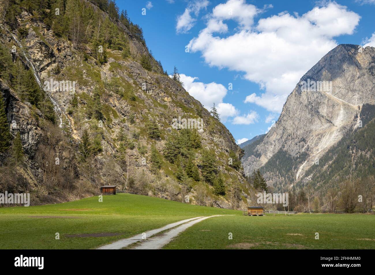 walking along the river to a waterfall at Platzl, Oetztal, Austria ...