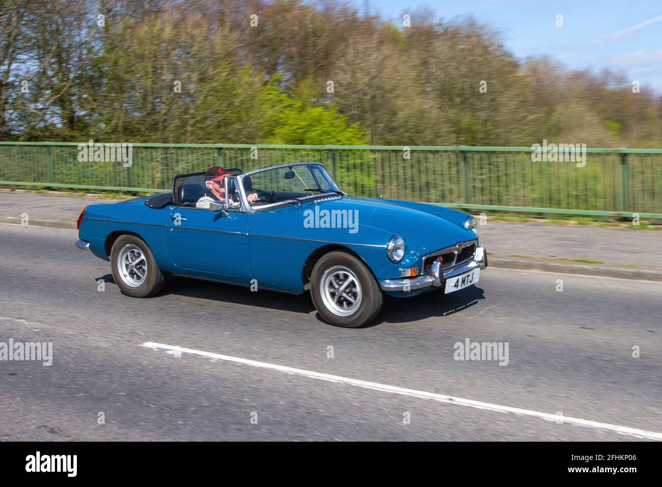 1972 blue 70s MG B 1798cc sports car; moving vehicles, cars, vehicle ...