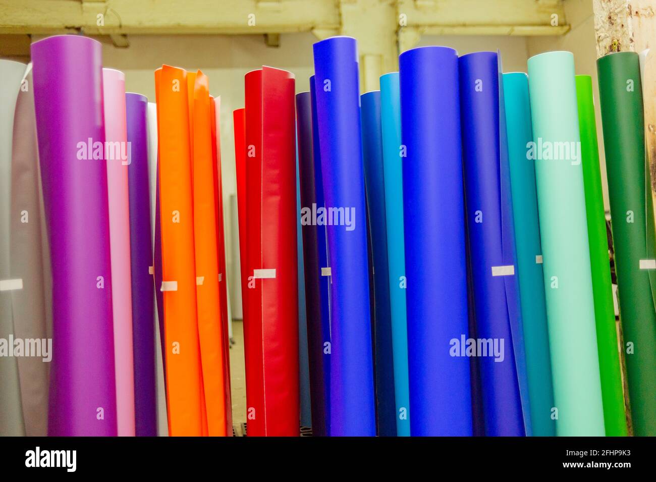 Row of various colored vinyl car wrapping or plotter cutting sticker ...