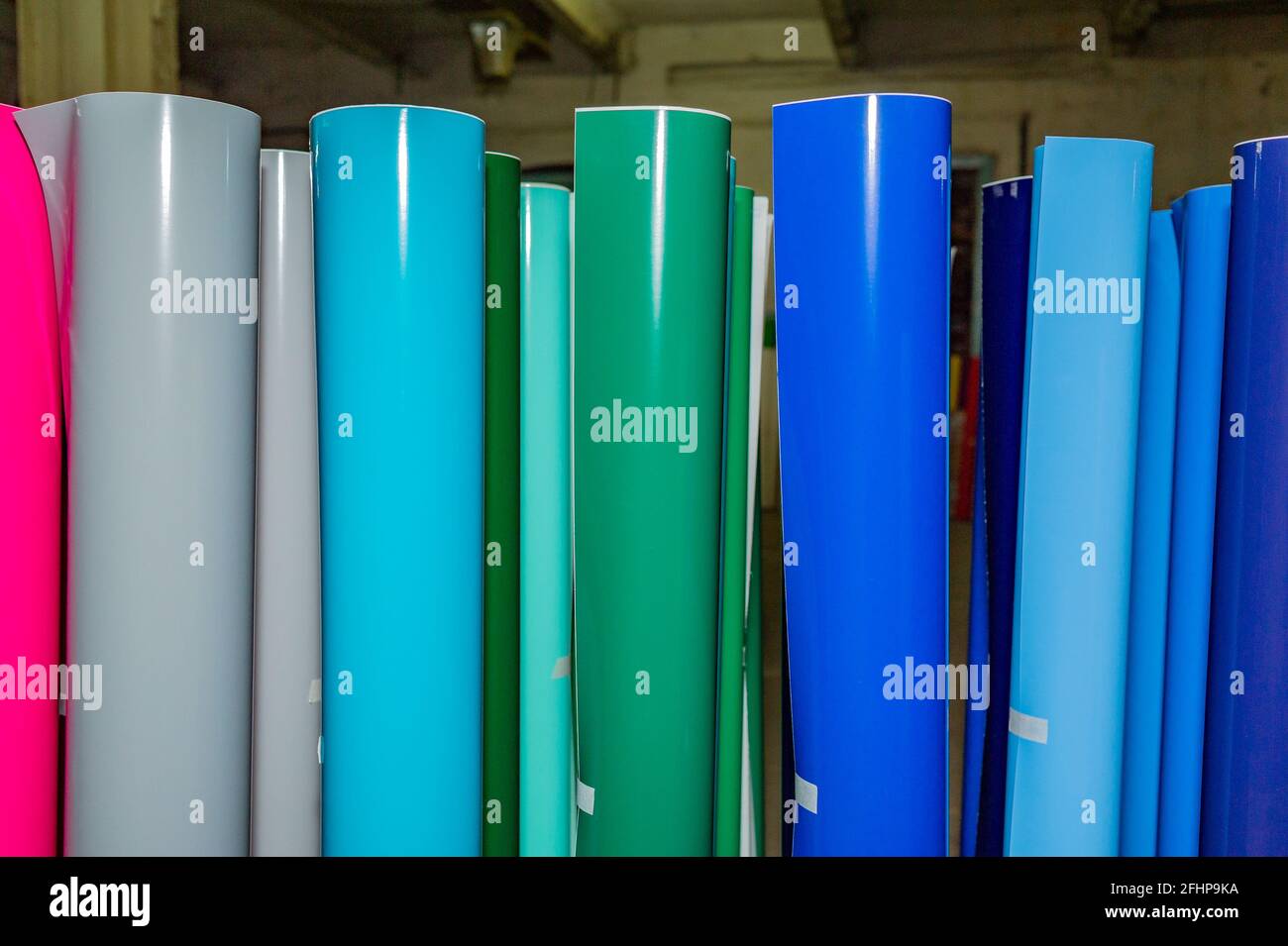 Row of various colored vinyl car wrapping or plotter cutting sticker ...
