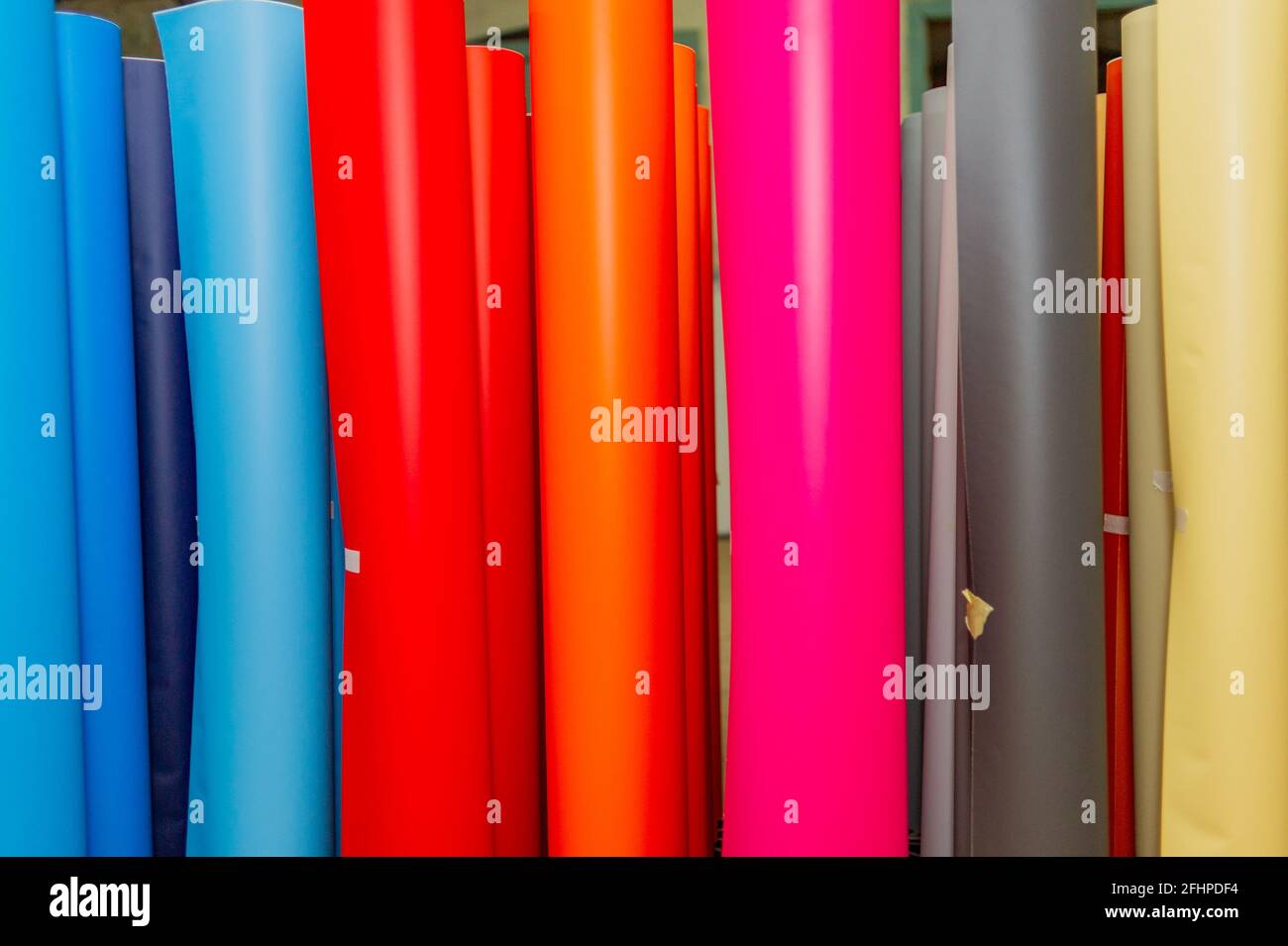Row of various colored vinyl car wrapping or plotter cutting sticker ...