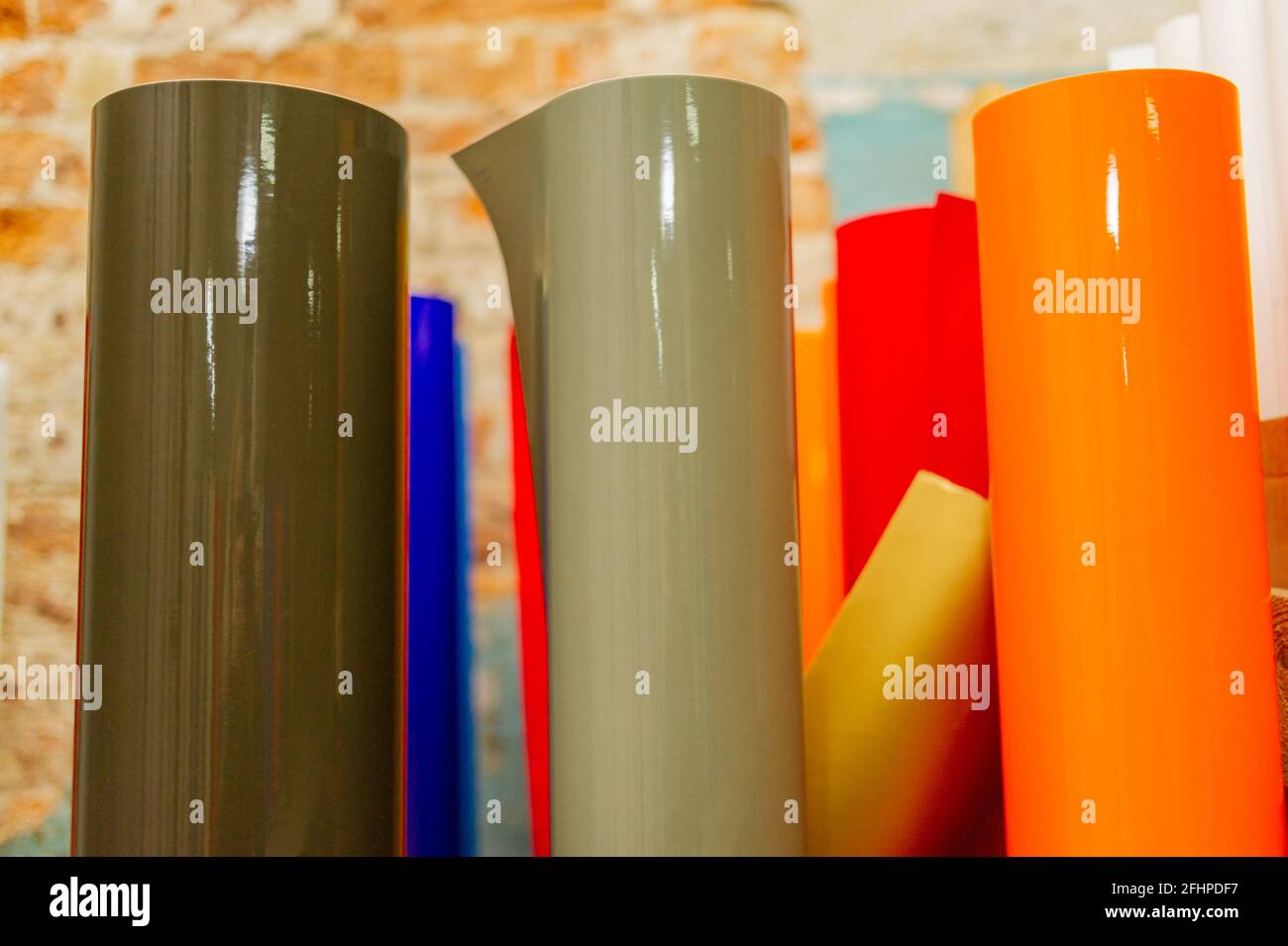 Row of various colored vinyl car wrapping or plotter cutting sticker ...