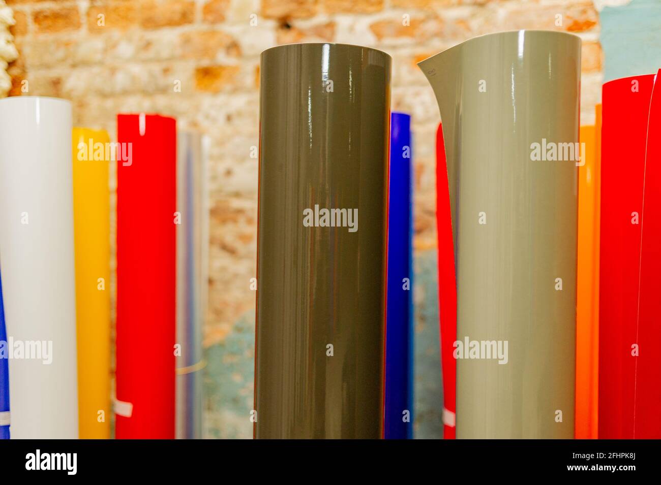 Row of various colored vinyl car wrapping or plotter cutting sticker ...