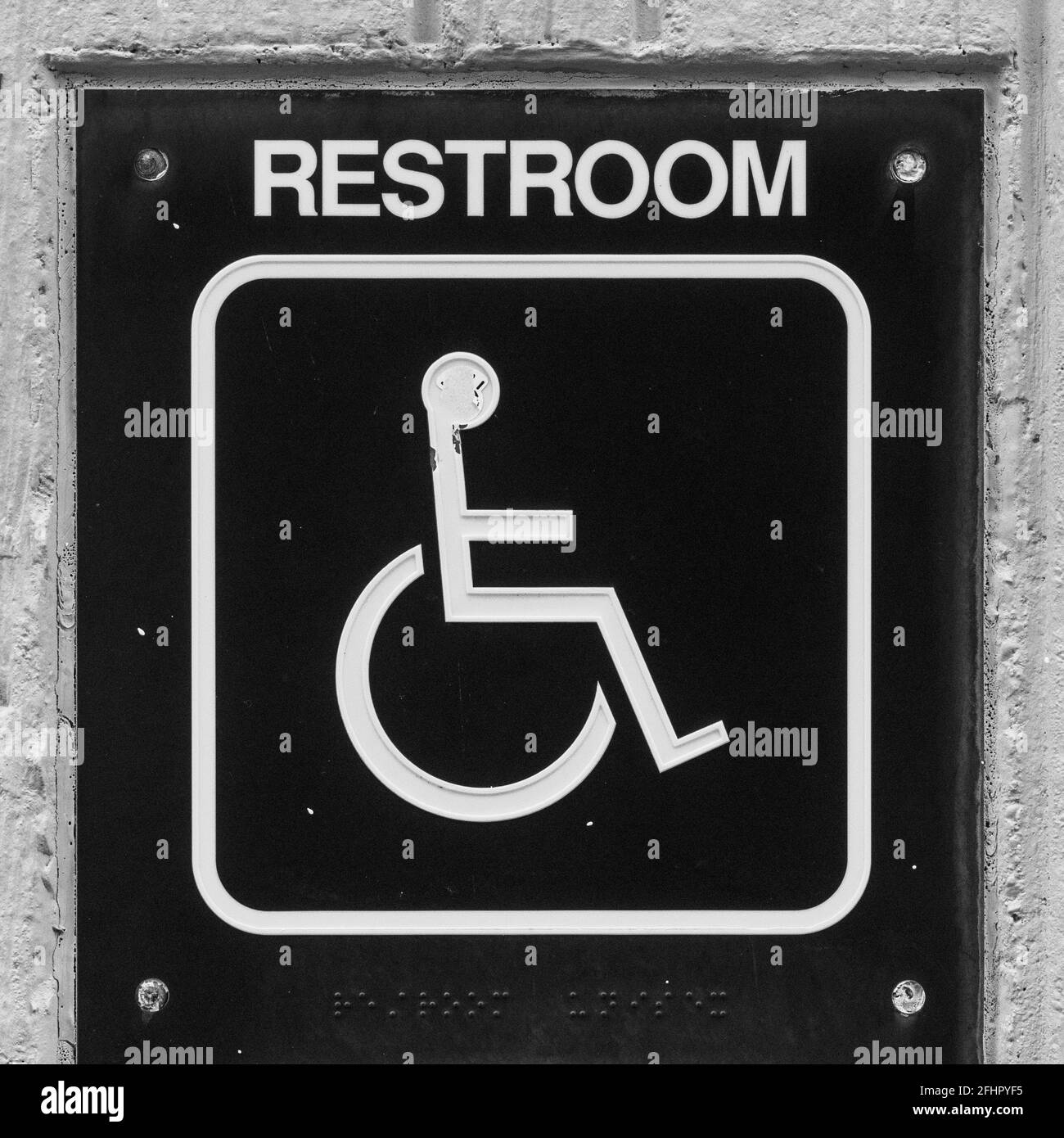Handicap Accessible Restroom Sign On Building Stock Photo - Alamy