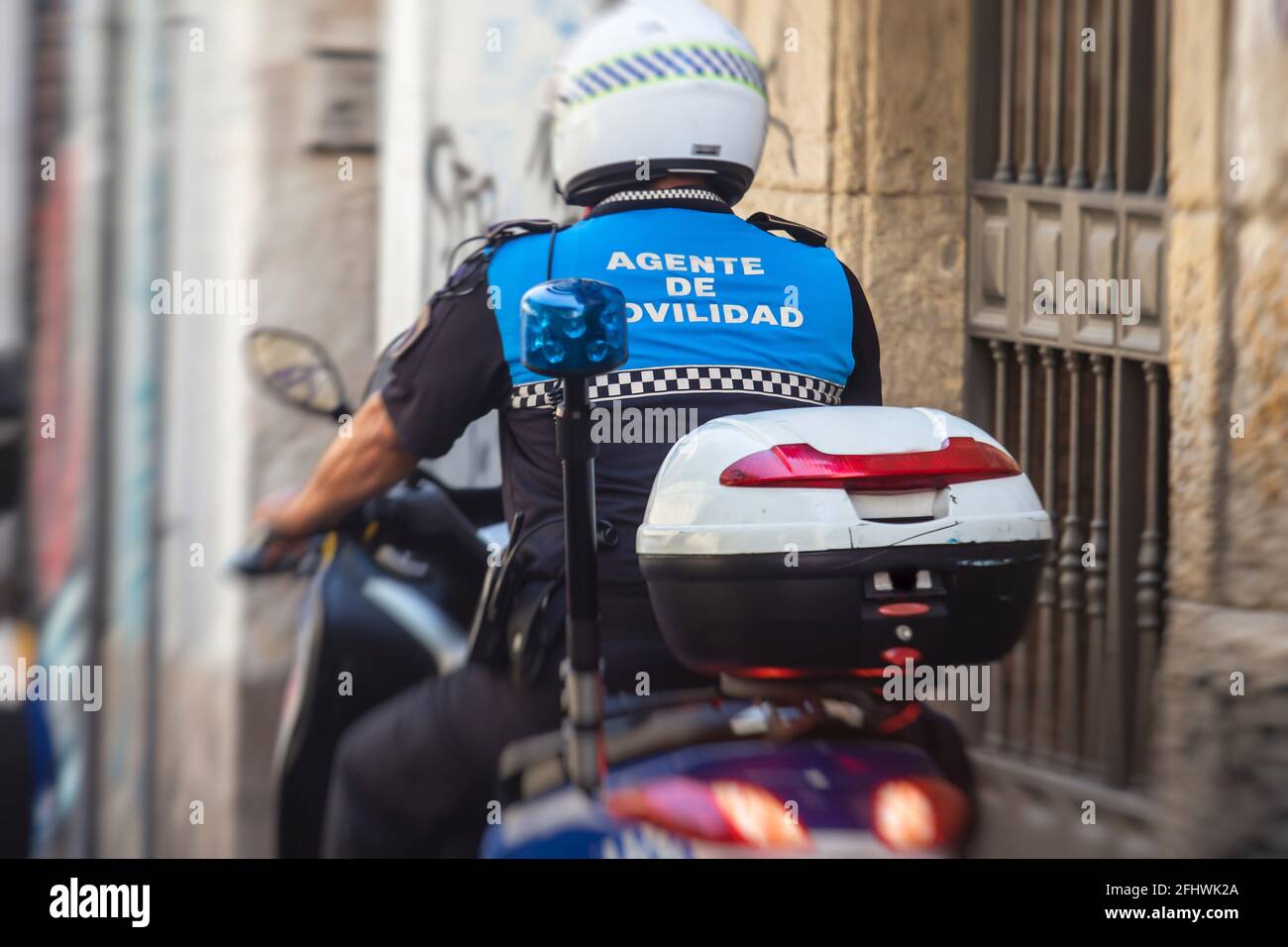 Spanish police squad formation on bike and motorcycle back view with ...