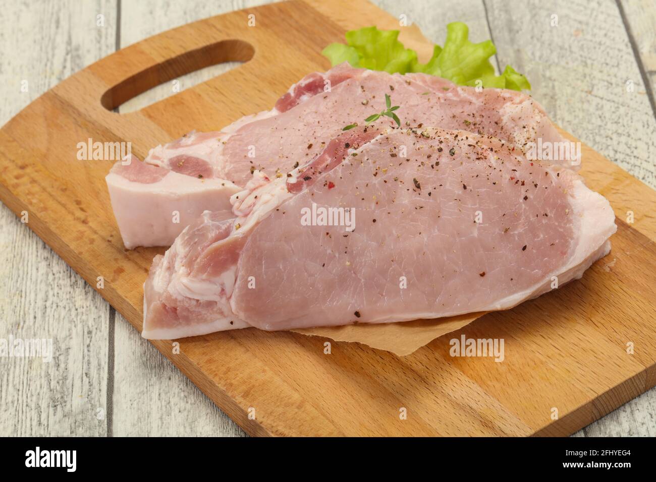 Raw pork meat steak ready for grill Stock Photo - Alamy