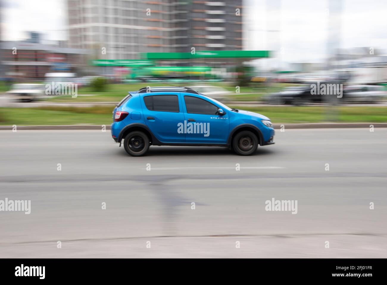 Ukraine, Kyiv - 20 April 2021: Light Blue Renault Duster car moving on ...