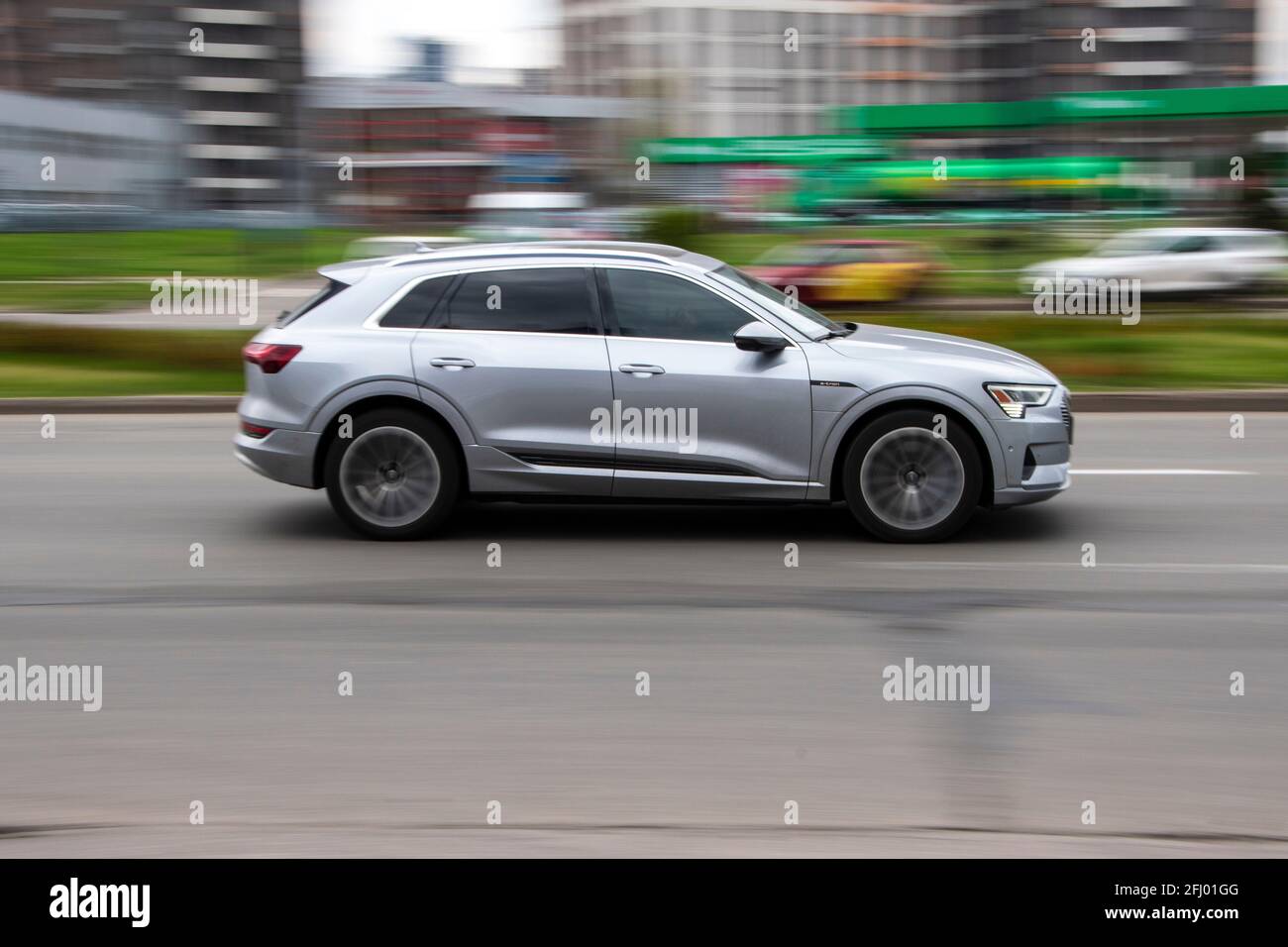 Ukraine, Kyiv - 20 April 2021: Silver Audi e-tron car moving on the ...