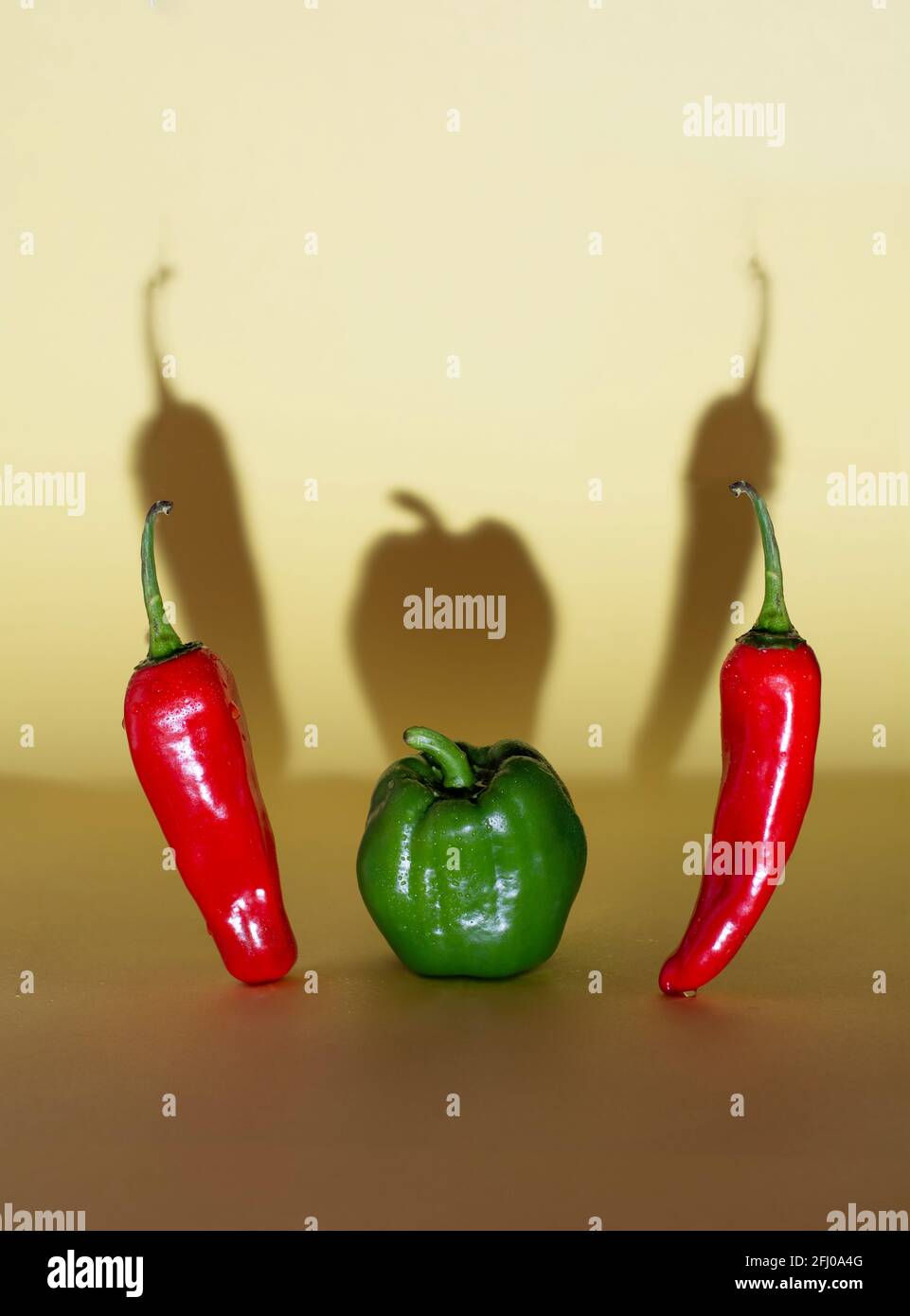 Dramatic evil Picture of chilli and capsicum ( Peppers ) with shadow ...