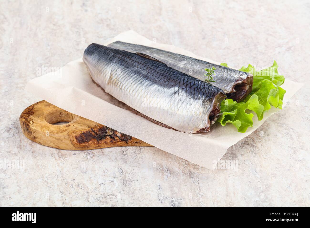 Marinated Herring fillet with skin for cooking Stock Photo - Alamy
