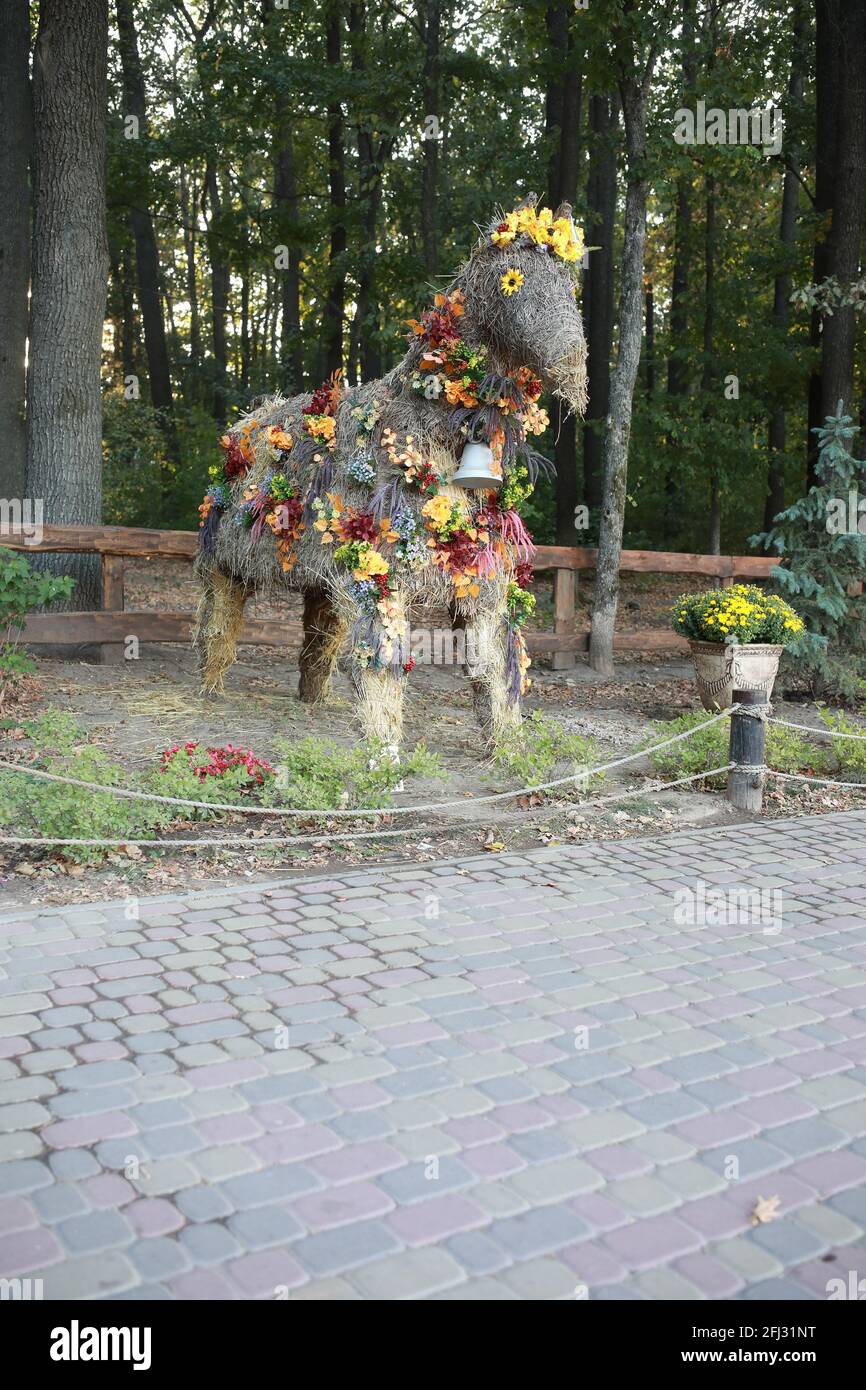 beautiful horse made of hay art art standing in the park Stock Photo ...
