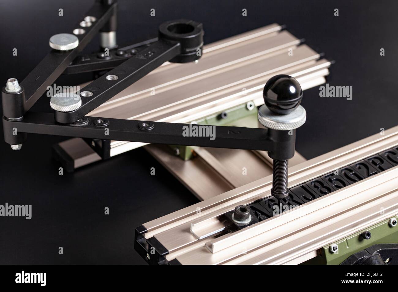 Engraving device pantograph with letterpress alphabet Stock Photo - Alamy