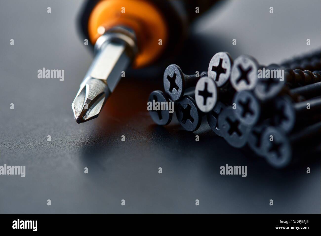 Self tapping screws and screwdriver with bit Stock Photo - Alamy