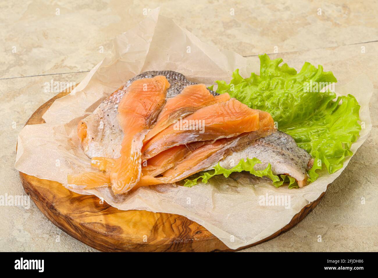 Sliced natural wild trout fillet over board Stock Photo - Alamy