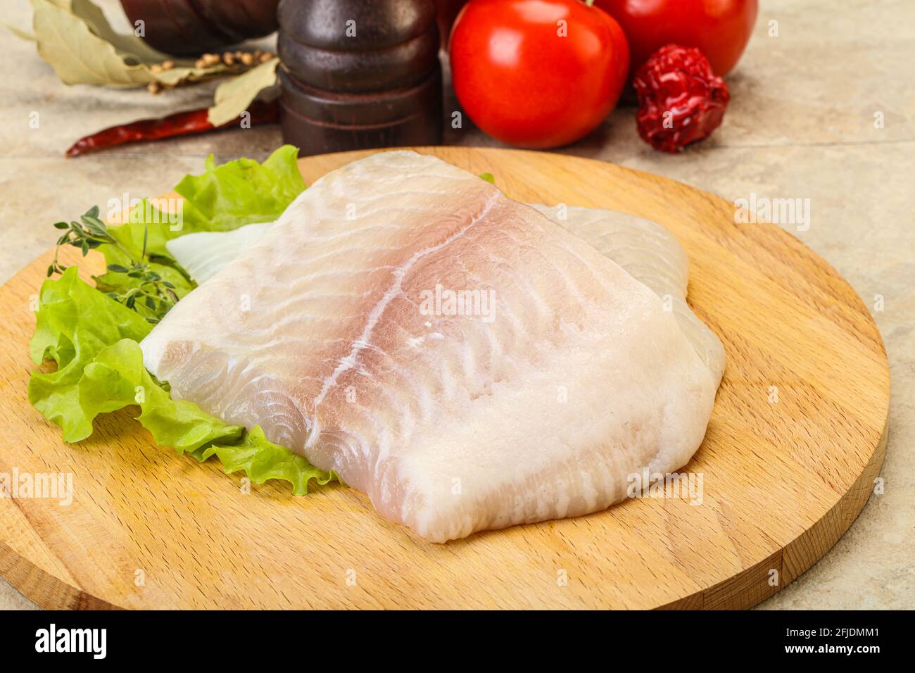 Raw pangasius fillet fish for cooking Stock Photo - Alamy