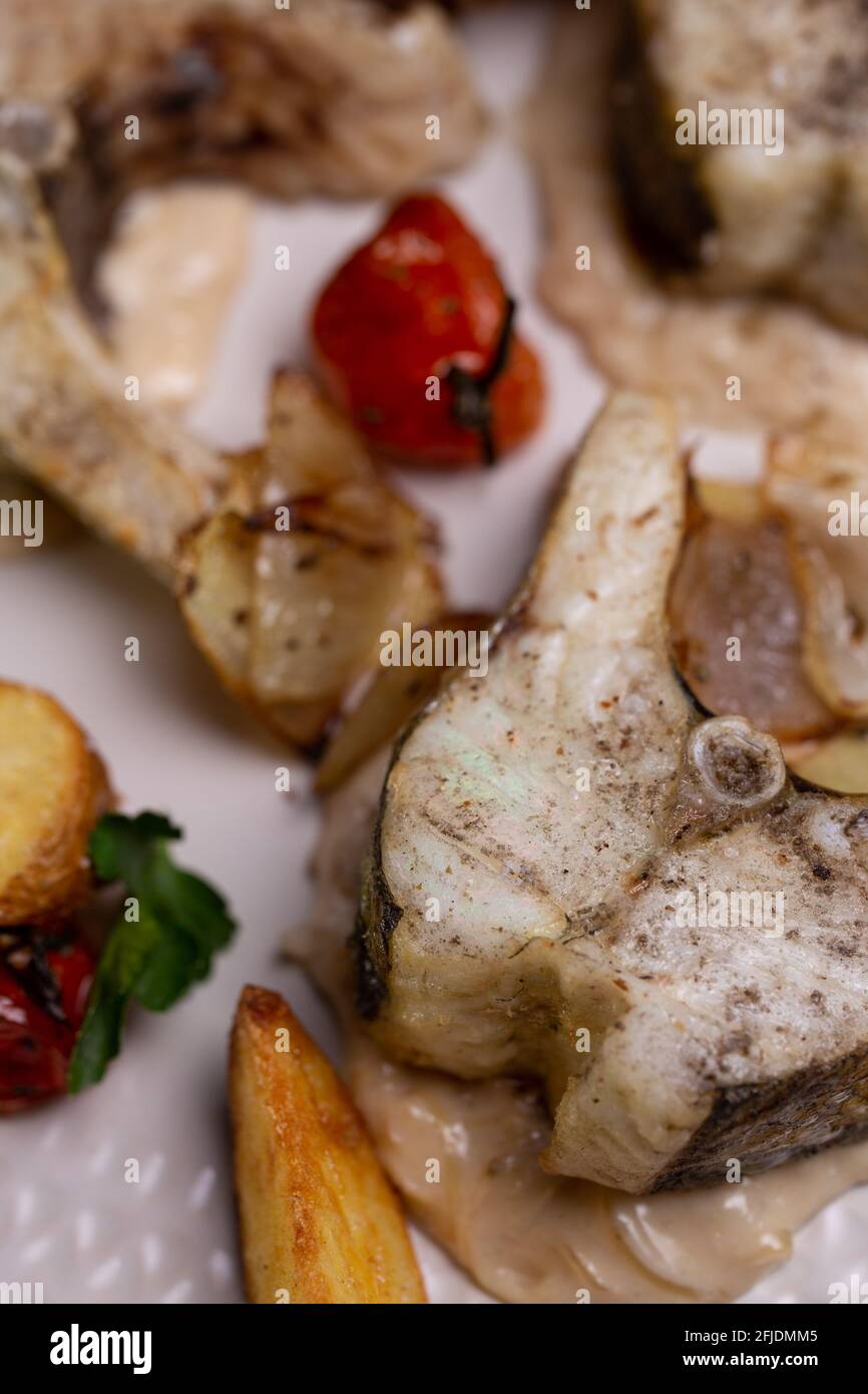 dish of pieces of fish close - up at the restaurant Stock Photo - Alamy