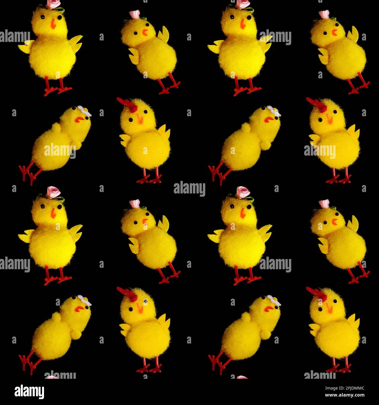 seamless pattern of yellow chickens isolated on a black background ...