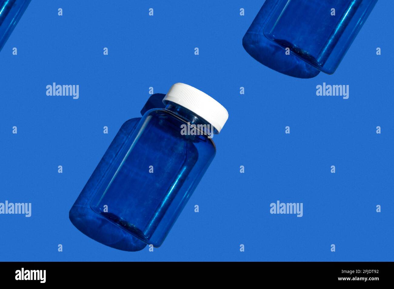 Medicine jar pattern. Fashionable blue medicine jar on a bright blue ...