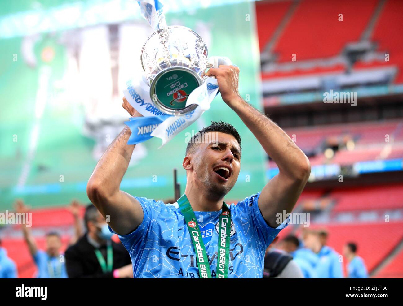Manchester City's Rodri celebrates with the trophy after winning the ...