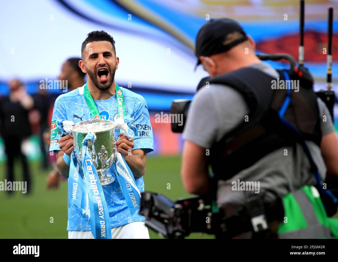 Manchester City's Riyad Mahrez celebrates with the trophy after winning ...