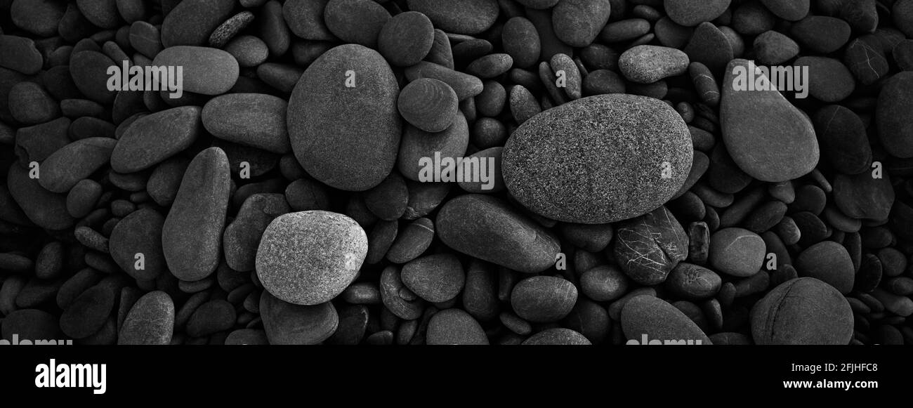 Dark black abstract smooth round pebbles sea texture background Stock ...